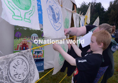 40033714-Young visitor Jacob Spall made a climate protest flag with ...