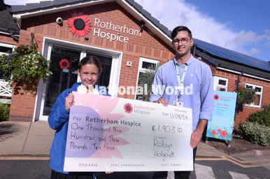 40035546-Herringthorpe youngster Robyn Holyoak presented a cheque for £ ...