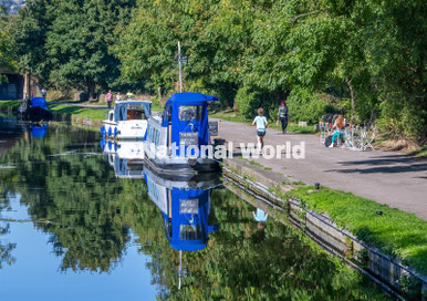 40037248-Visitors pass the Pretty Boat Cafe on the Leeds Liverpool ...