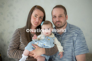 40037565-Parents Charlotte Dale and Bret Richardson with their 5 month ...