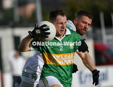 40048257-Craigbane’s Brian Rainey grapples with Ballymaguigan’s Owen ...