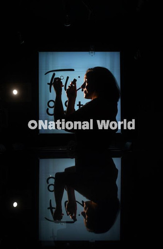 40052360-Jessica Flinn-Allen Checks one of the rings at Flinn & Steel ...