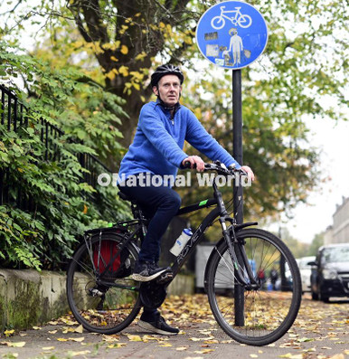 40055662-John Devlin 30/10/2024 GLASGOW. Alastair Dalton on his bike ...