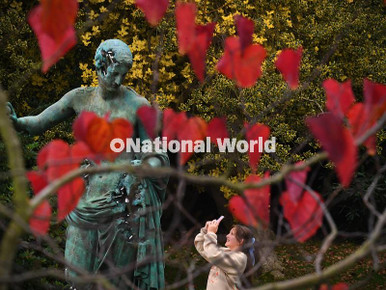 40056153-Theia Godfrey from Elland takes a picture of the statue called ...