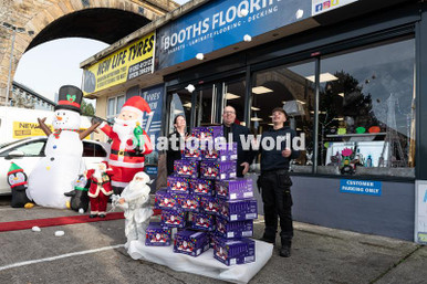 40071615-(l-r) Katy Booth sales assistant, Paul Booth dierctor and ...