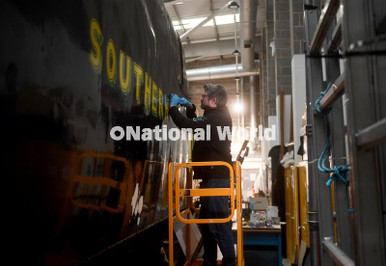 40074758-Senior Conservator Dean Smith working on the Q1 tender ...