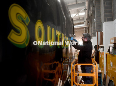 40074757-Senior Conservator Dean Smith working on the Q1 tender ...