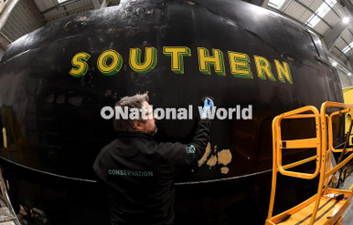 40074755-Senior Conservator Dean Smith working on the Q1 tender ...