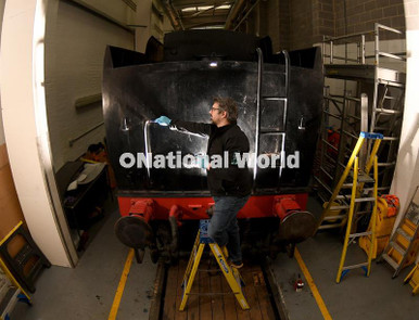 40074752-Senior Conservator Dean Smith working on the Q1 tender ...