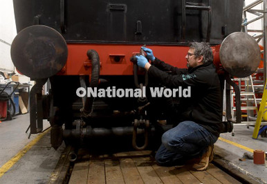40074753-Senior Conservator Dean Smith working on the Q1 tender ...