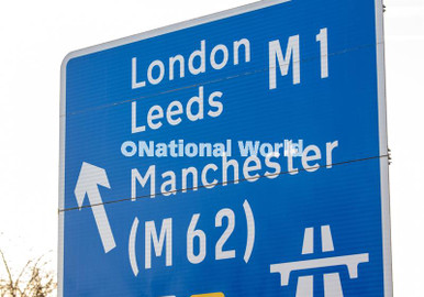 40088145-Sign for the M1 motorway London and Leeds and M62 Manchester ...