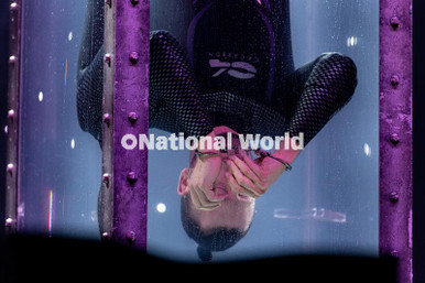 40100617-Andrew Basso escapes from an enclosed water tank on the Comedy ...