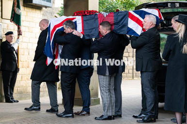 40101144-The coffin of veteran Ted Davidson is carried into Burnley ...