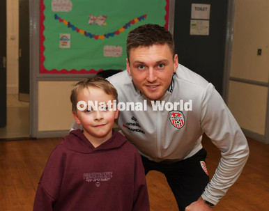 40102449-Deaglan Martin (9) pictured with Derry City player Hayden Cann ...
