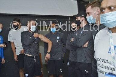 39029412-New vaccination centre opens at the Posh Ground. Posh players ...