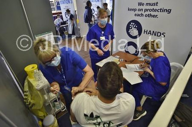 39029417-New vaccination centre opens at the Posh Ground Posh player ...
