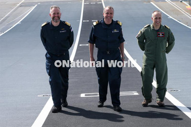 40277043-From left, Captain Will Blackett RN, Commanding Officer of HMS ...