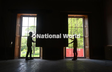40317173-As work continues inside and outside the building, we take an ...