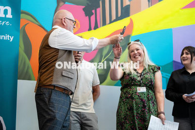 40342550-Retiring CEO Jeff Marsh hands the key over to incoming CEO ...