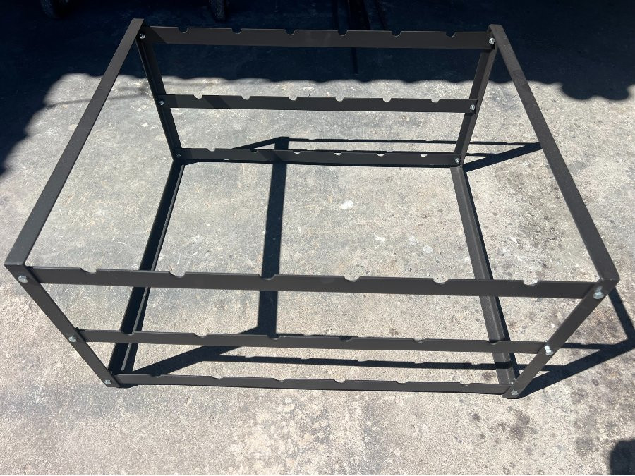 Churrasco Rack for cooking Brazilian BBQ over a masonry firebox.