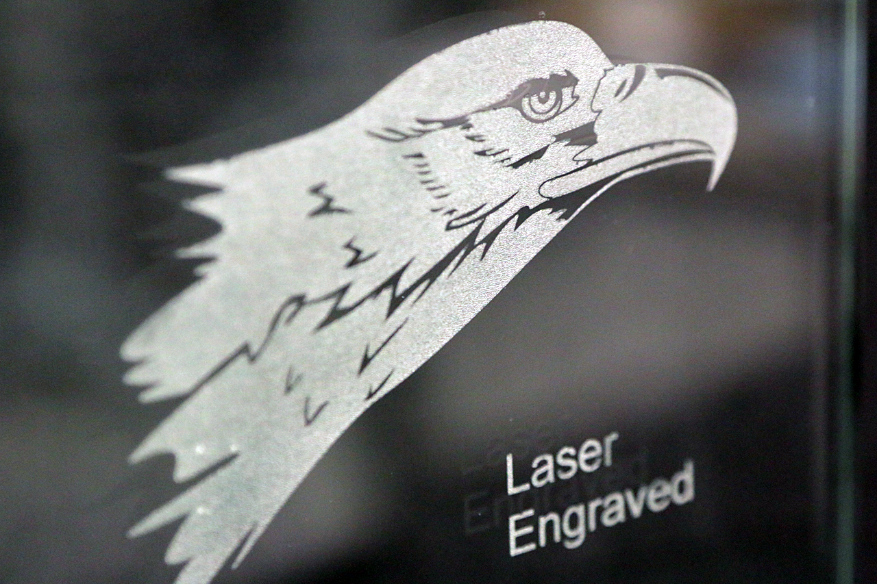 Sandcarving vs. Laser Engraving - IKONICS Imaging