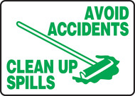 Spills signs remind employees to clean up spills for safety.