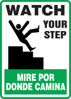 Construction bilingual signs alert others in dual languages.