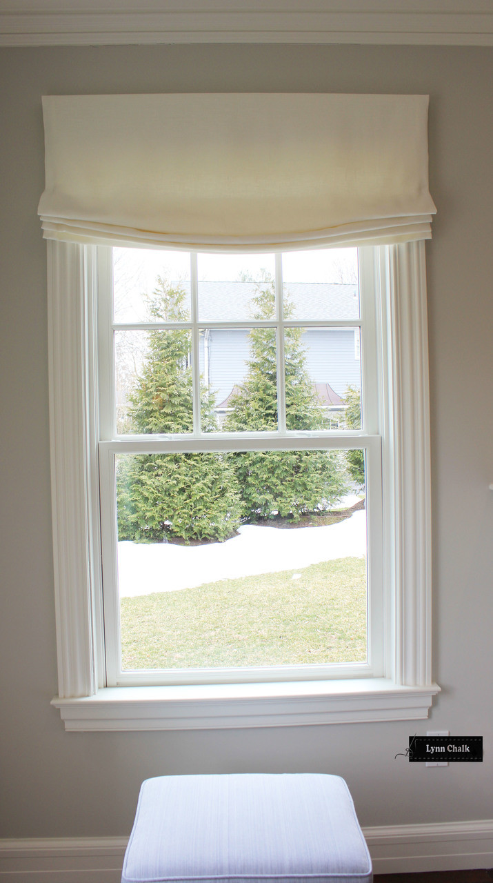 Relaxed Roman Shades and Drapes in Living Room