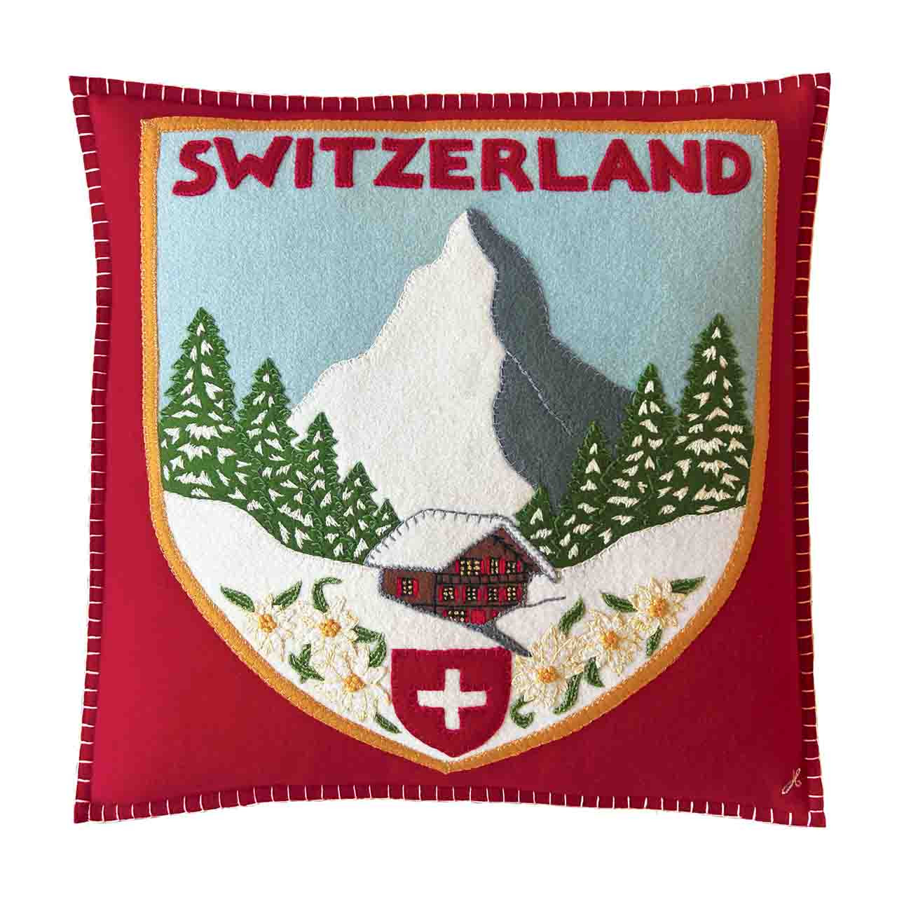 Red Wool Swiss Chalet Badge Cushion | Jan Constantine
