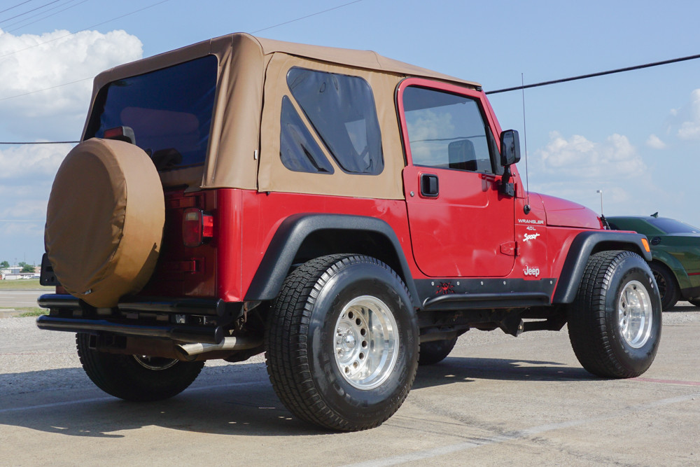 SOLD 1998 Jeep Wrangler Sport Chilipepper Stock# 784818 - Collins Bros Jeep