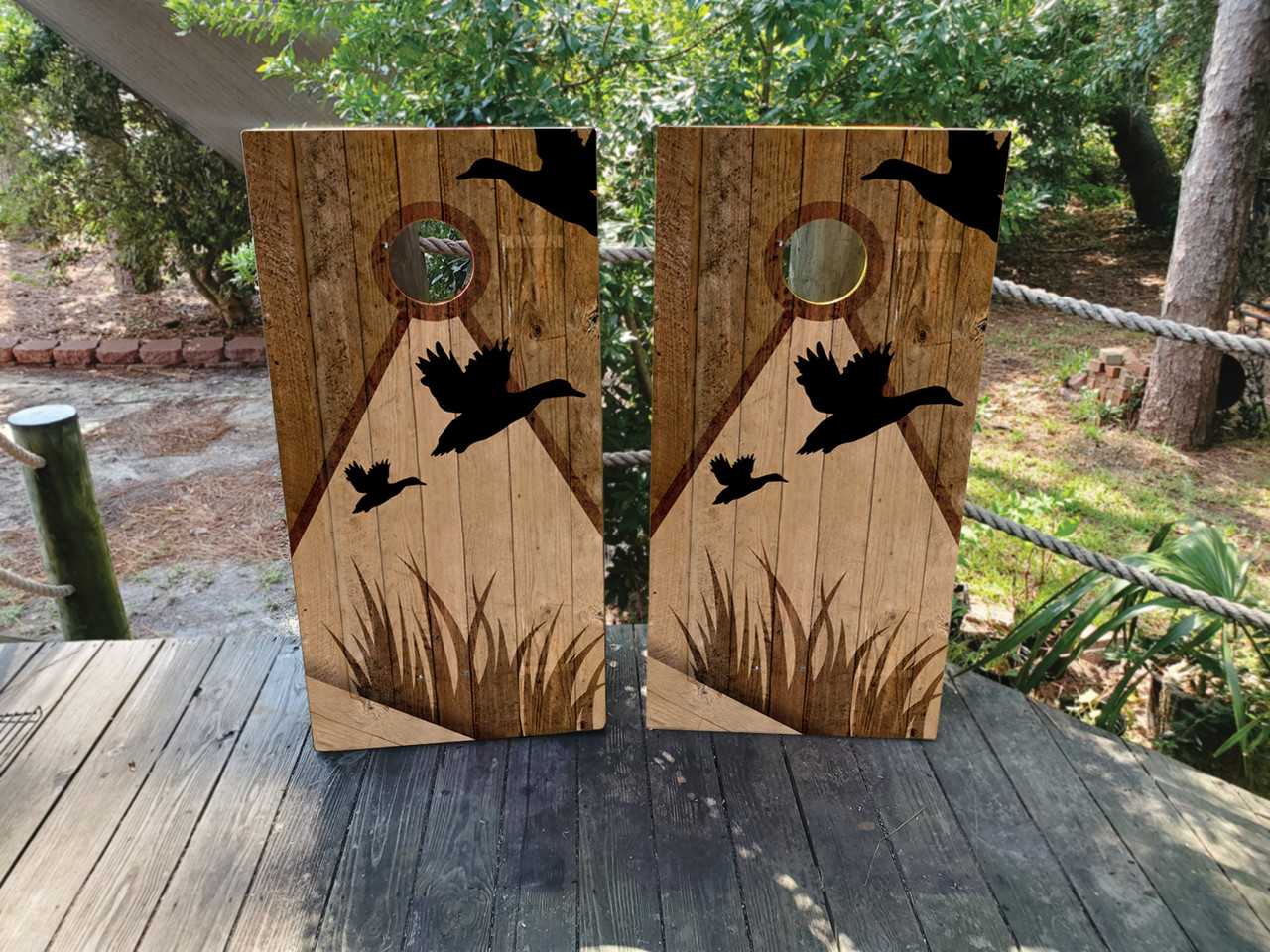 Rustic Serenity: Duck-Themed Cornhole Wraps on Wood Grain Background