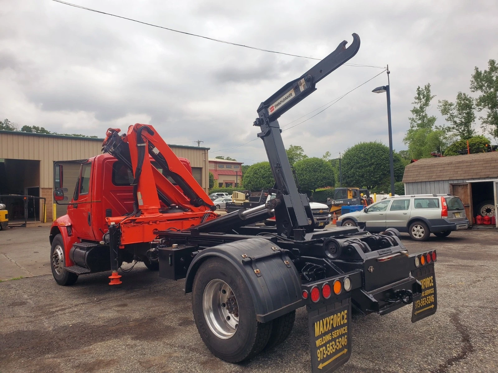 Hooklift and Roll-Off Trucks for Sale