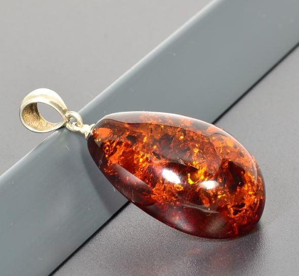 Amber Pendant Made of Dark Cognac Color Amber.