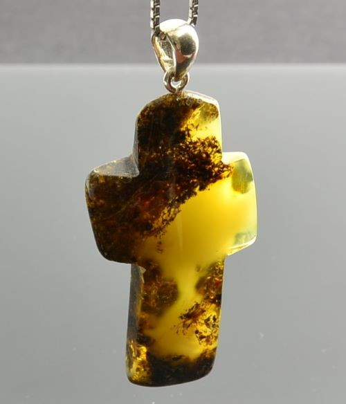 Amber Cross Pendant Cut From A Single Piece Of Baltic Amber.