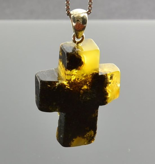 Amber Cross Pendant Cut From A Single Piece Of Baltic Amber.