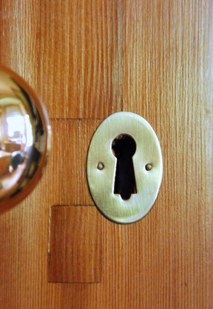 Tradco Escutcheon Keyhole Cover | 44 x 30mm | Polished Brass
