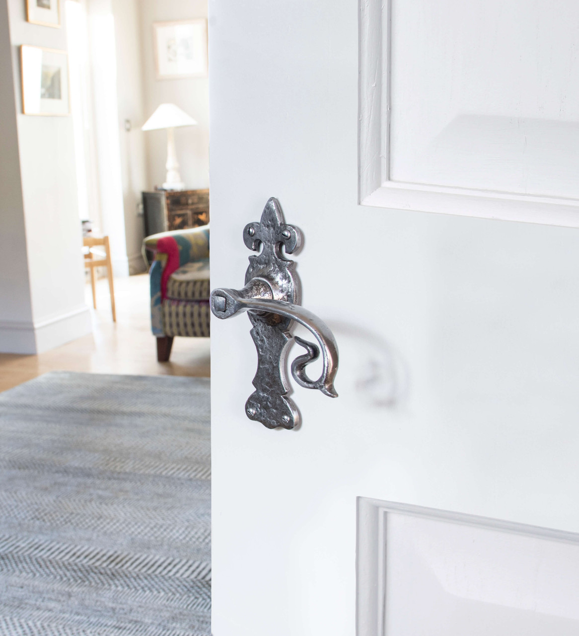 From The Anvil Curly Lever Door Handle | Natural Textured