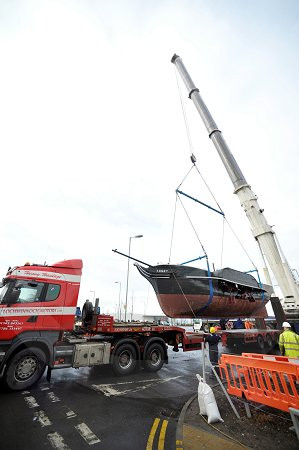 14130669-Replica of the PS Comet boat in Port Glasgow being lifted on ...