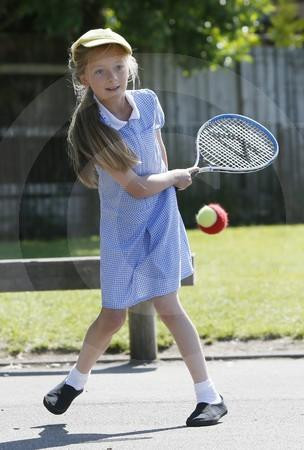24820910-Caldercuilt Primary School, Glasgow children play tennis in ...