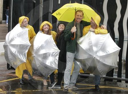 28366761-The cast of Singin in the Rain performing at the Kings Theatre ...