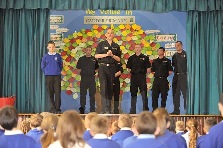 14817157-11 year old Cadder primary pupil Dylan Auld receives a ...