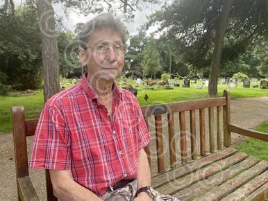 39084176-John Bettles, tends to the grave of his daughter, Michelle ...