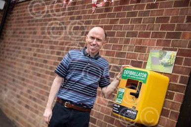 39461580-Rev Robert Foster with the new defibrilator at Whitehouse ...