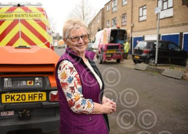 39380762-A very happy Val Humphries as work is being carried to repair ...