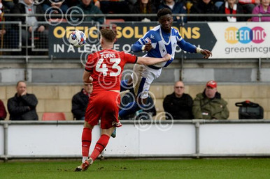 39683057-Samson Tovide of Colchester United looks to win a header in ...