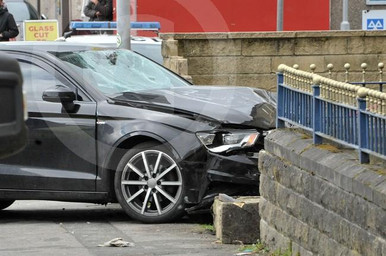 39684215-Police and Ambulance staff attend the scene where an Audi A3 ...