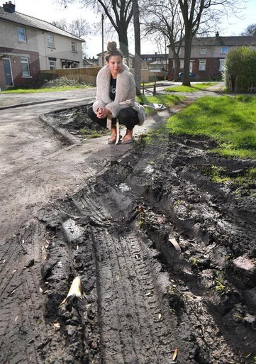 39686043-Holly daniel next to a next to muddy mess which is caused by ...