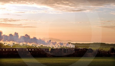 14542262-Two Stanier Black 5 steam trains pull an outing organised by ...