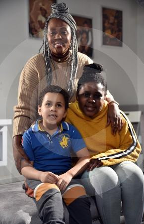 38524483-Angel Phiri, 11, helps her mum Angela to care for her younger ...