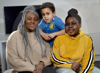 38524811-Angel Phiri, 11, helps her mum Angela to care for her younger ...